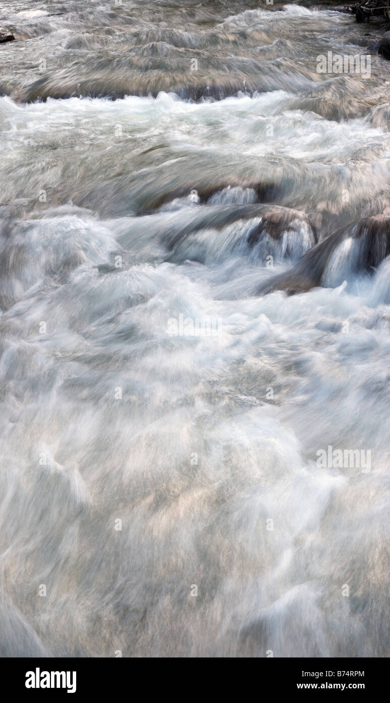 mountain river with rapid current background. Three shots composite ...