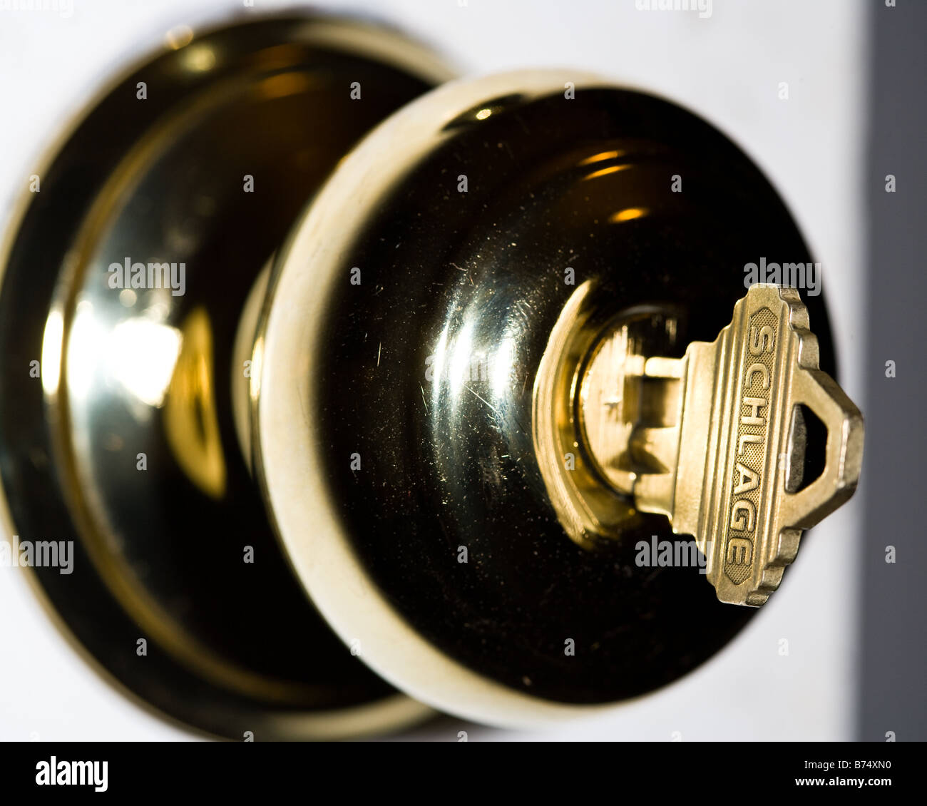 A door lock with key Stock Photo - Alamy