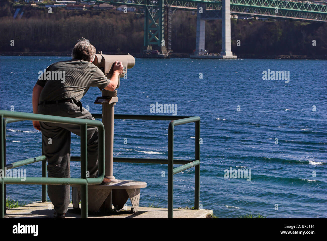 Using a Viewing Scope at Tacoma Narrows Park Stock Photo - Alamy