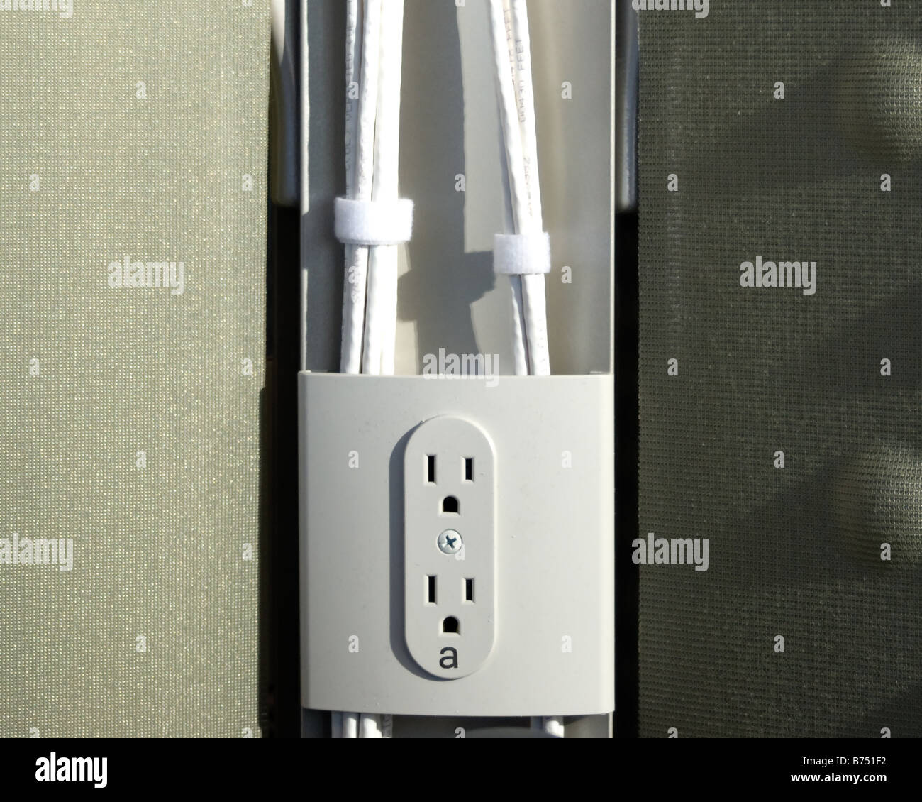 Electrical outlet in cubicle environment Stock Photo - Alamy