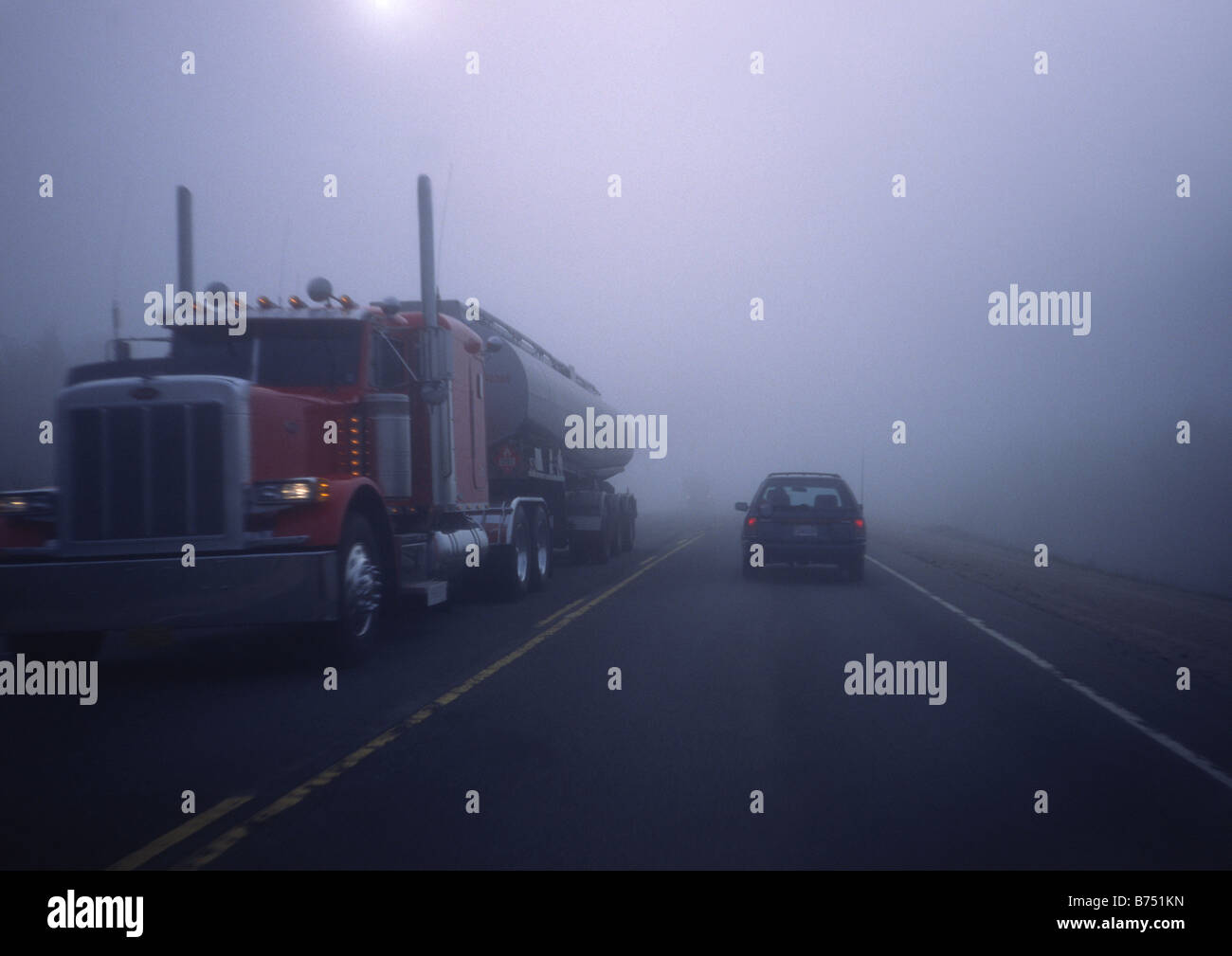 tanker truck, 18 wheeler, semi, travelling in fog on a highway Stock ...