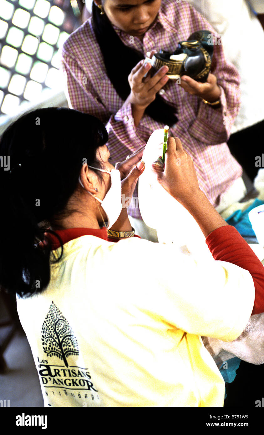 Wooden statues being constructed by students at the Chantier Ecoles off ...