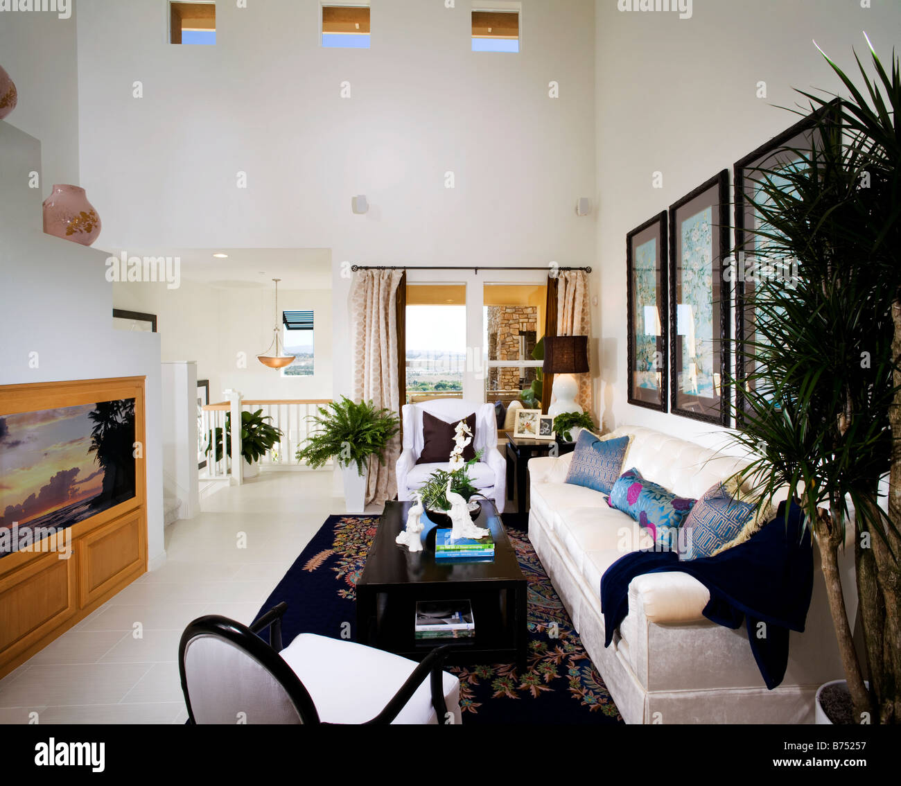 Bright blue room with windows Stock Photo - Alamy