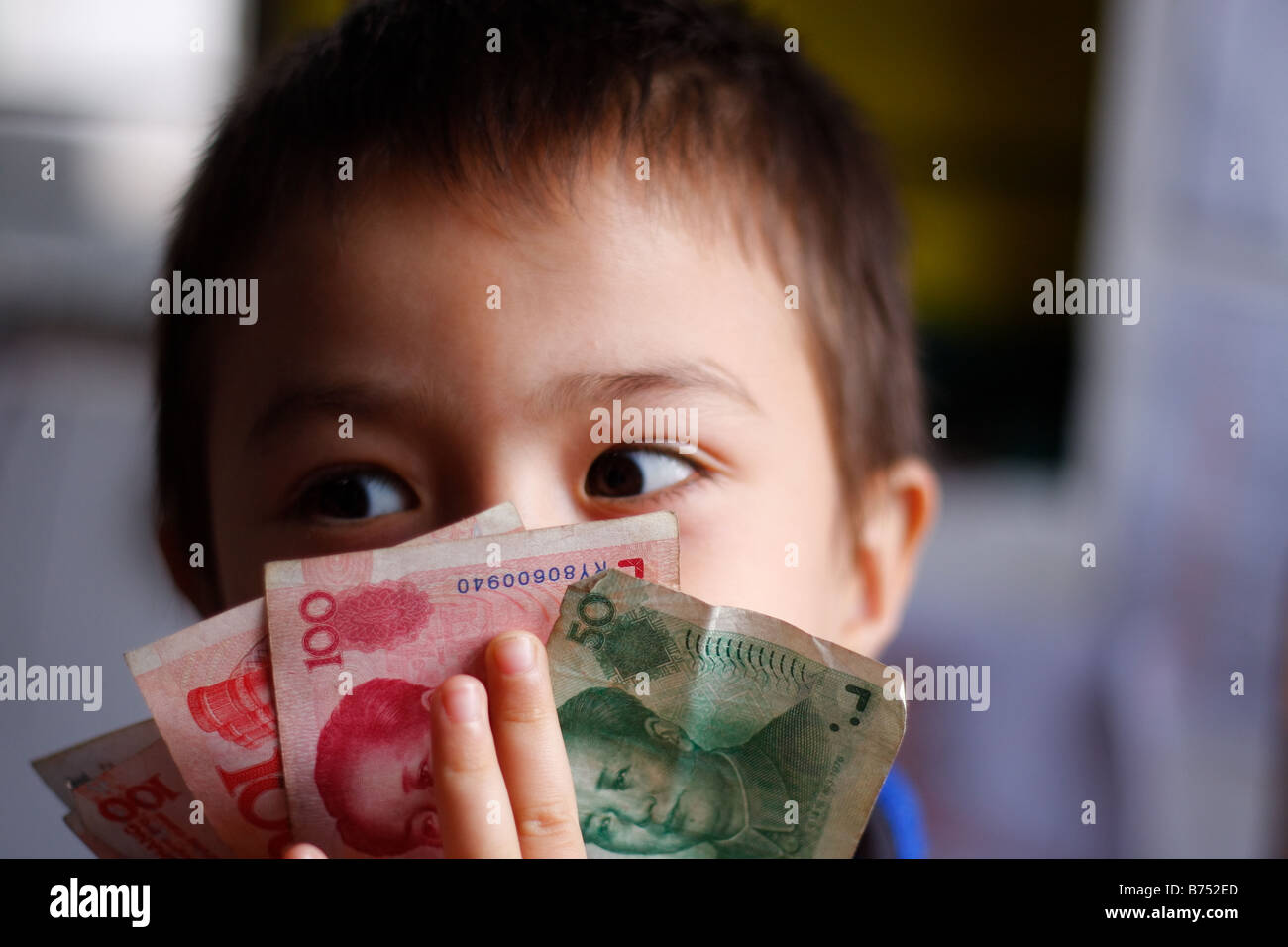 6 year old Asian Caucasian Chinese American boy playing with Chinese ...