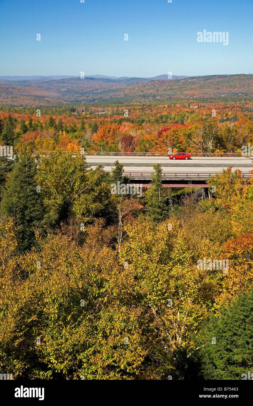 Car driving on Interstate 89 through Franconia Notch State Park with ...