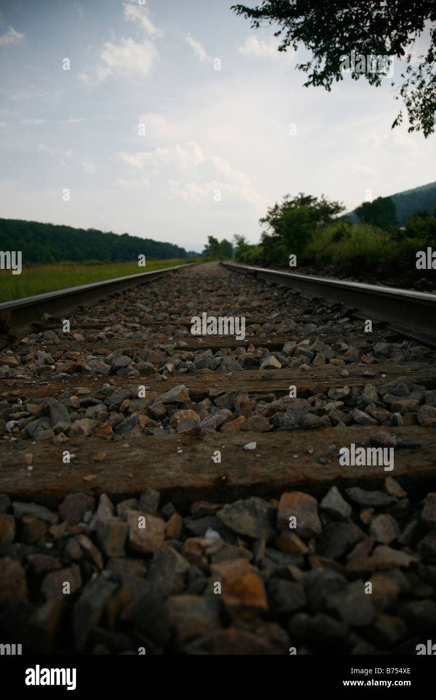 Photograph at ground level of train tracks Stock Photo - Alamy