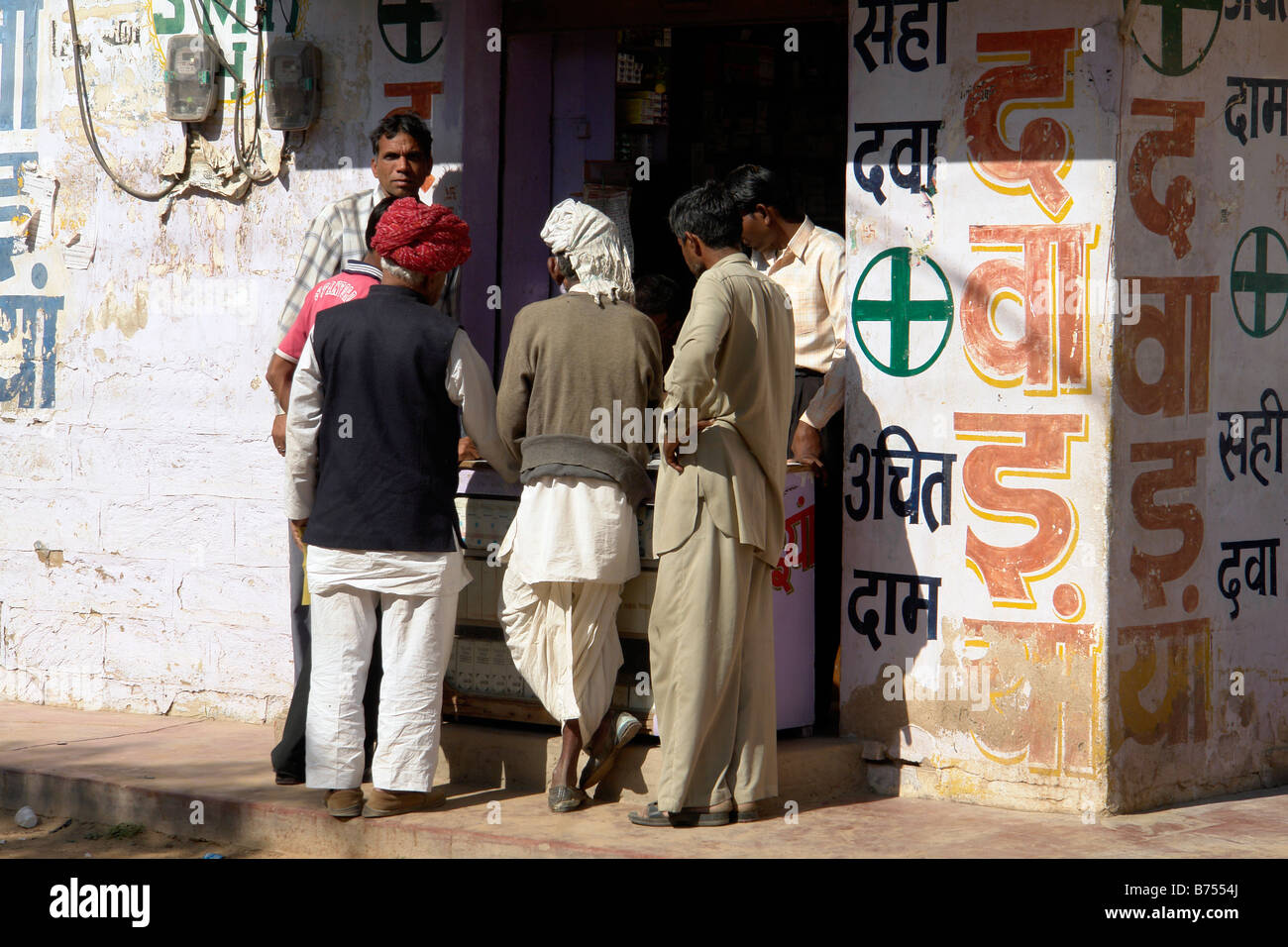 group of indian men at a local village shop at nawalgarh Stock Photo ...