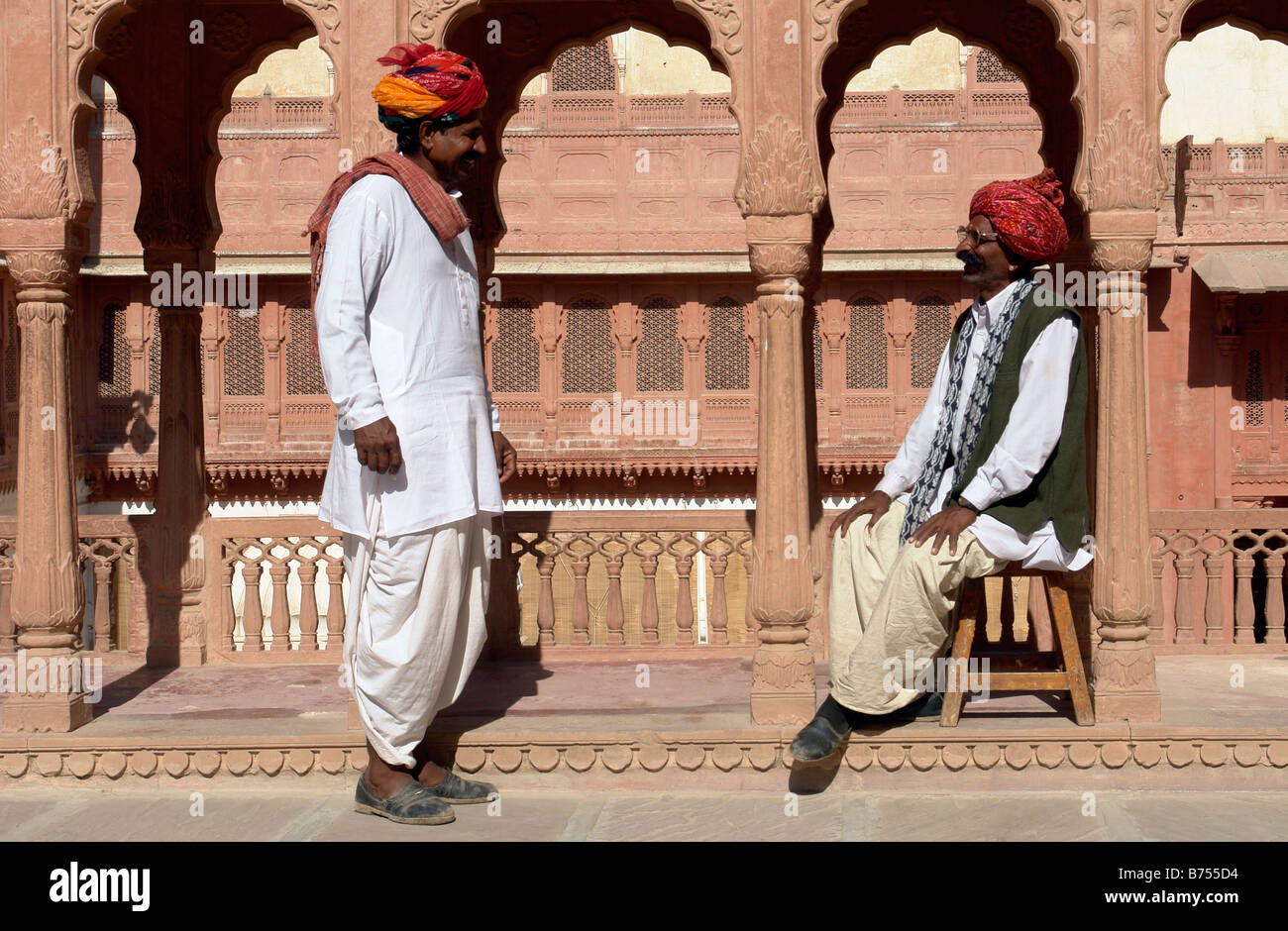 two indian men in conversation at the junagarh red fort at bikaner ...