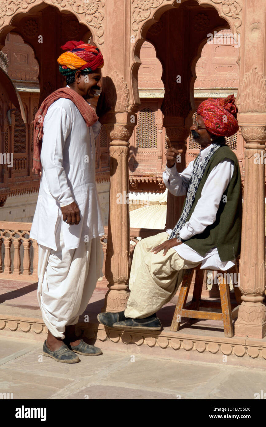 two indian men in conversation at the junagarh red fort in bikaner ...