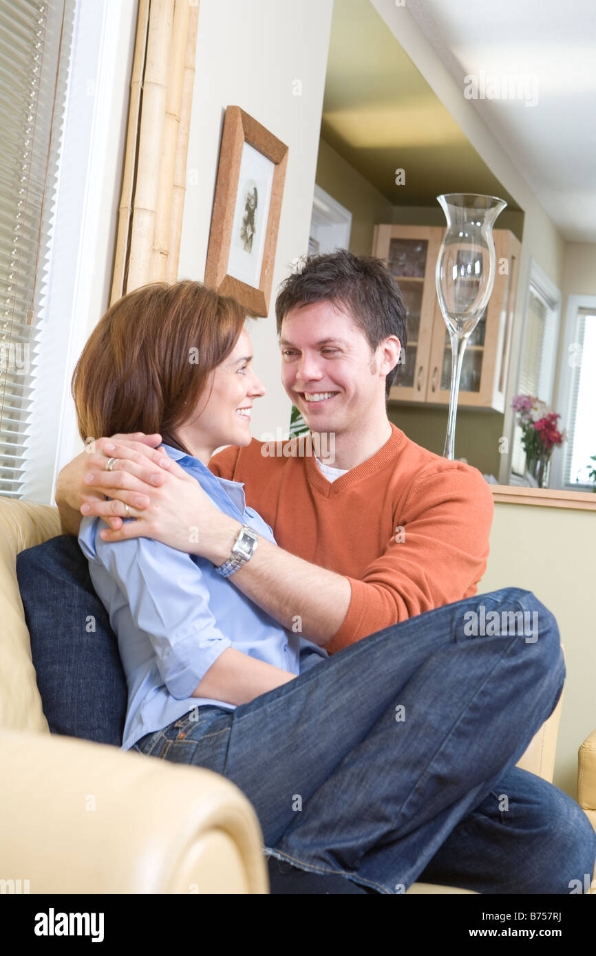 Couples embrace indoor hi-res stock photography and images - Alamy