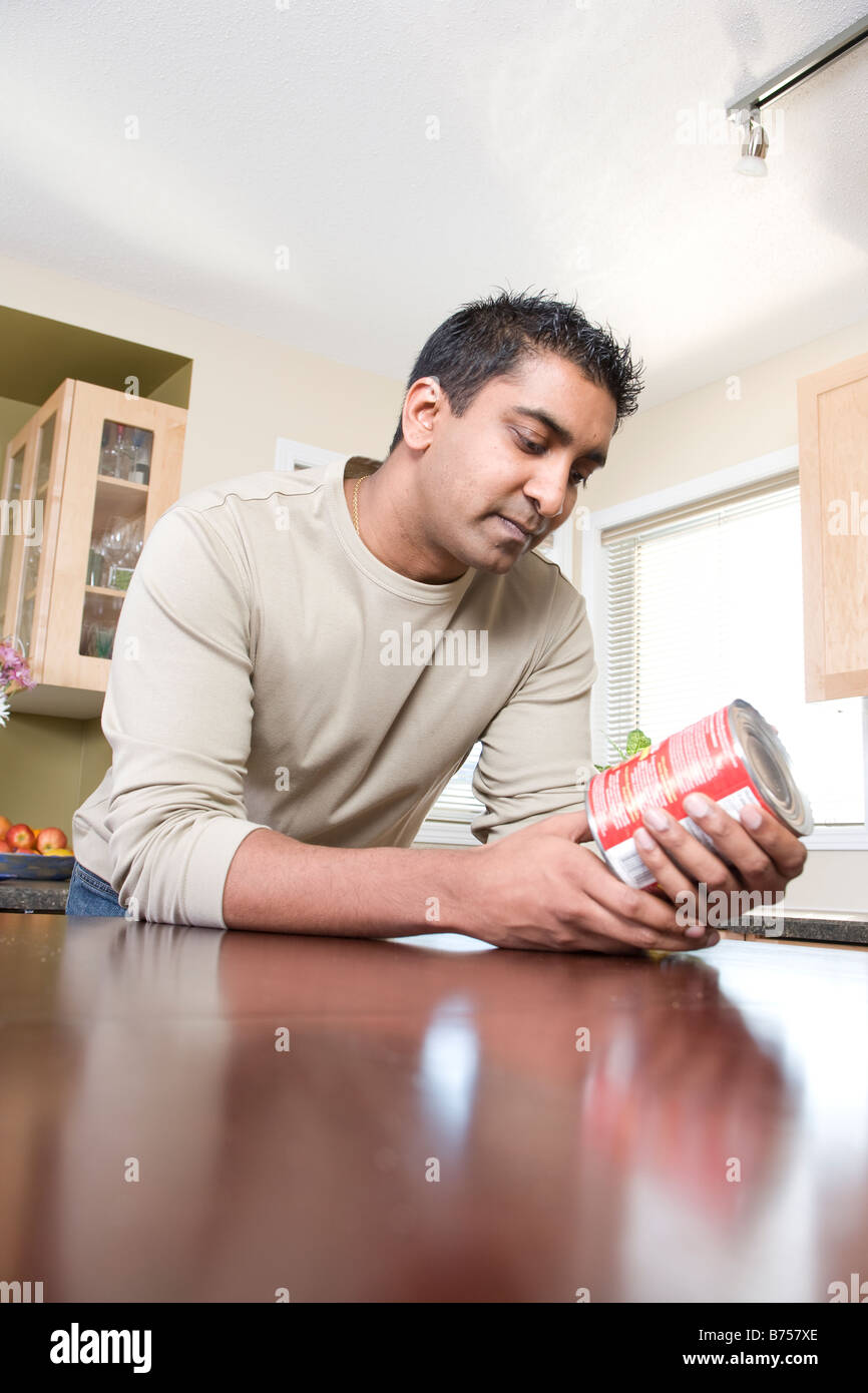 Nutrition can food reading hi-res stock photography and images - Alamy