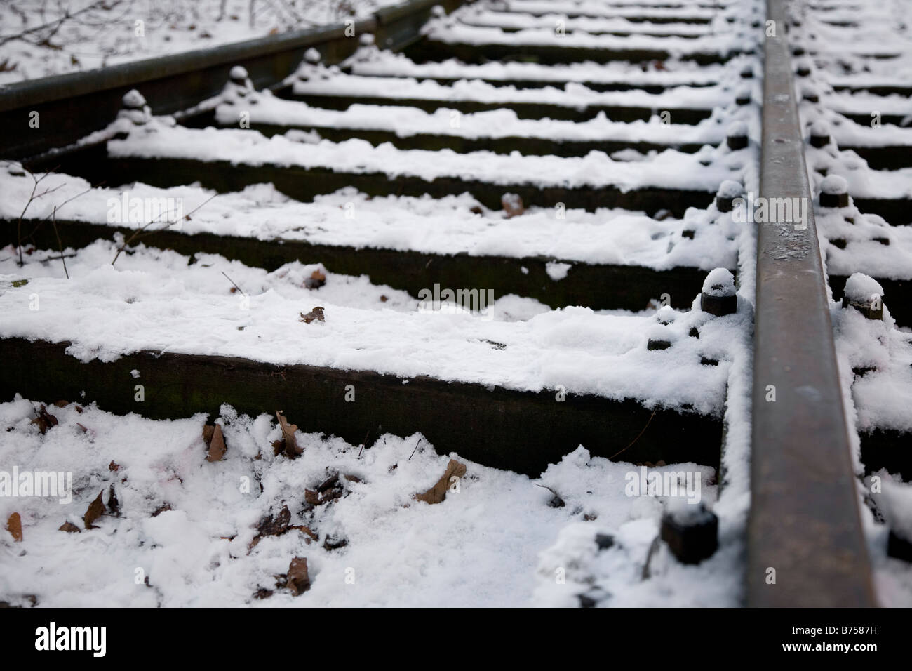 Rail tracks covered in snow Stock Photo - Alamy