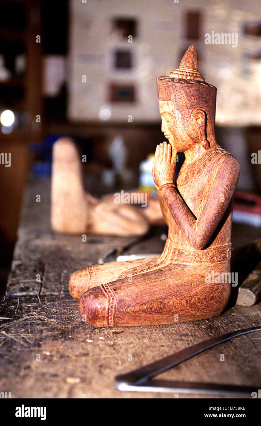 Wooden statue being constructed by students at the Chantier Ecoles off ...