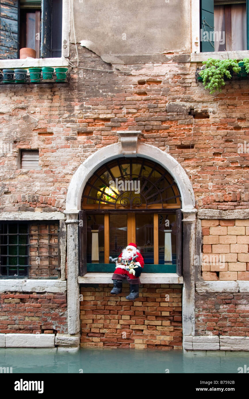 Santa Clause on the window sill of a restaurant in Venice, Italy Stock ...