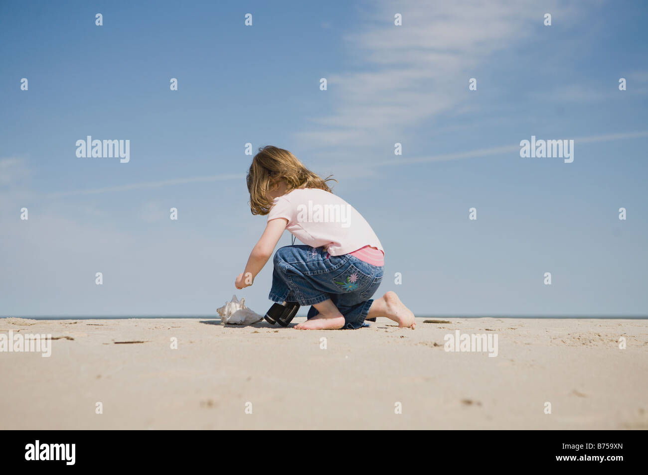 Picking Up Shells On Beach High Resolution Stock Photography and Images ...