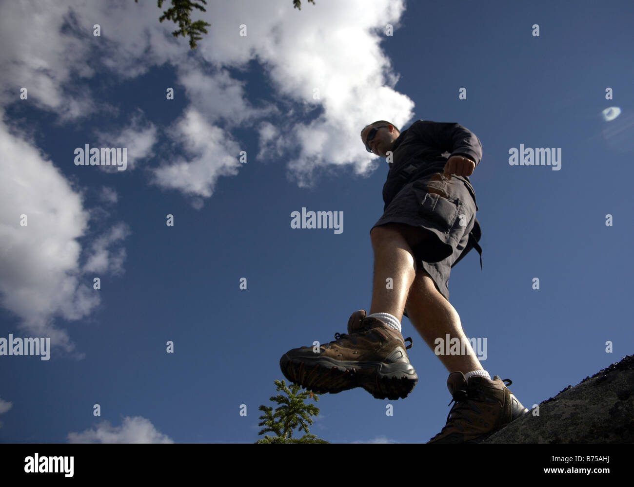 Male hiker striding through hi-res stock photography and images - Alamy