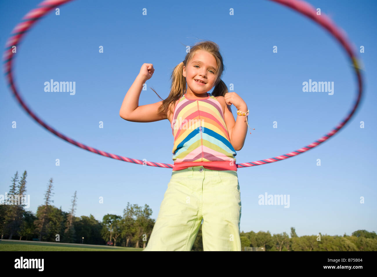 Kids playing with hula hoops hi-res stock photography and images - Alamy