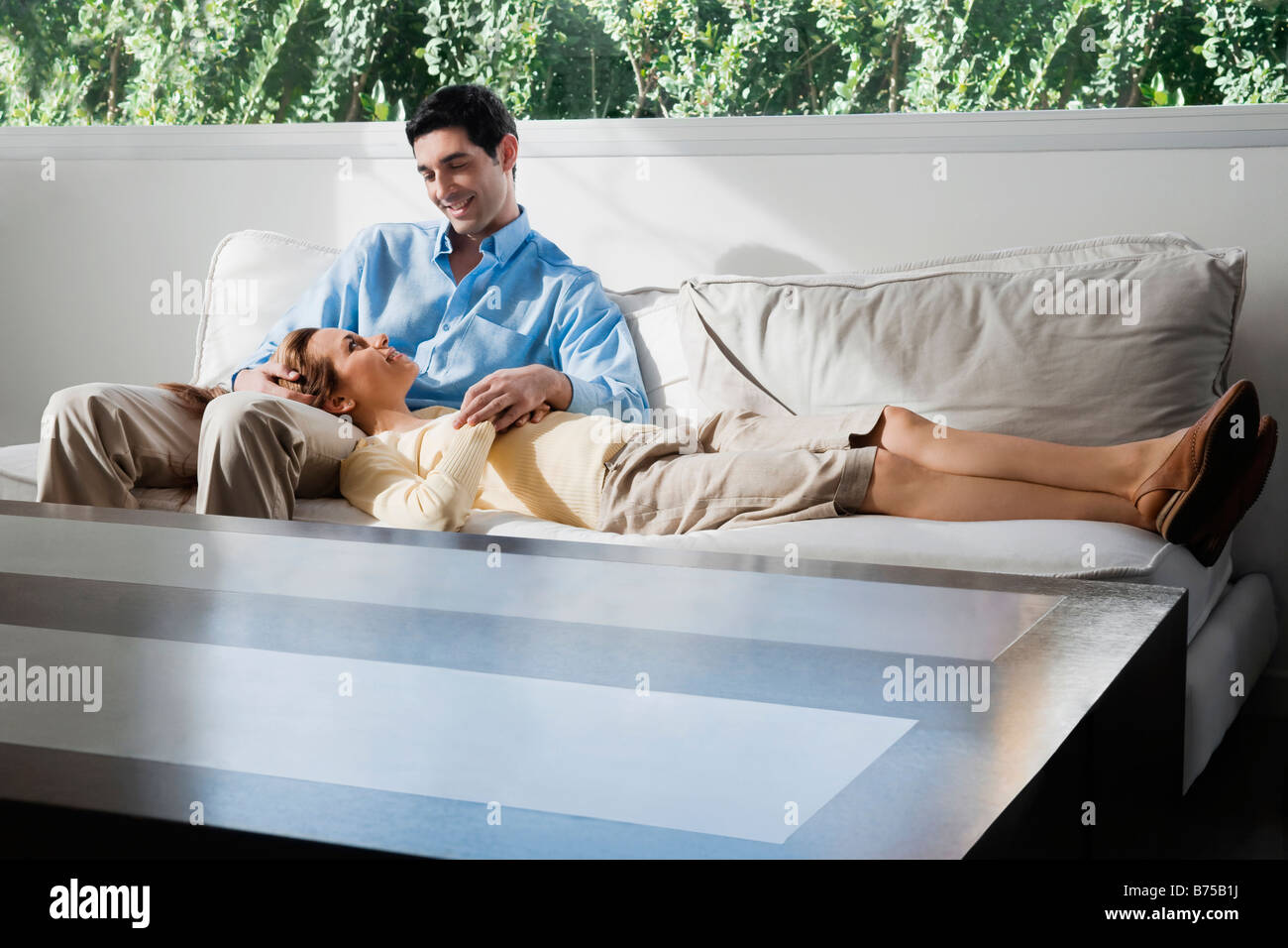 Woman sit on mans lap hi-res stock photography and images - Alamy