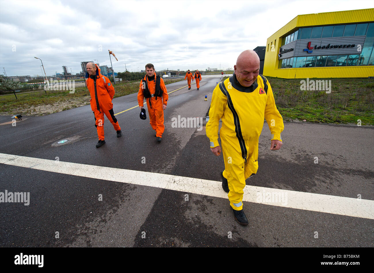 Rotterdam pilots on their way to the helicopter Stock Photo - Alamy