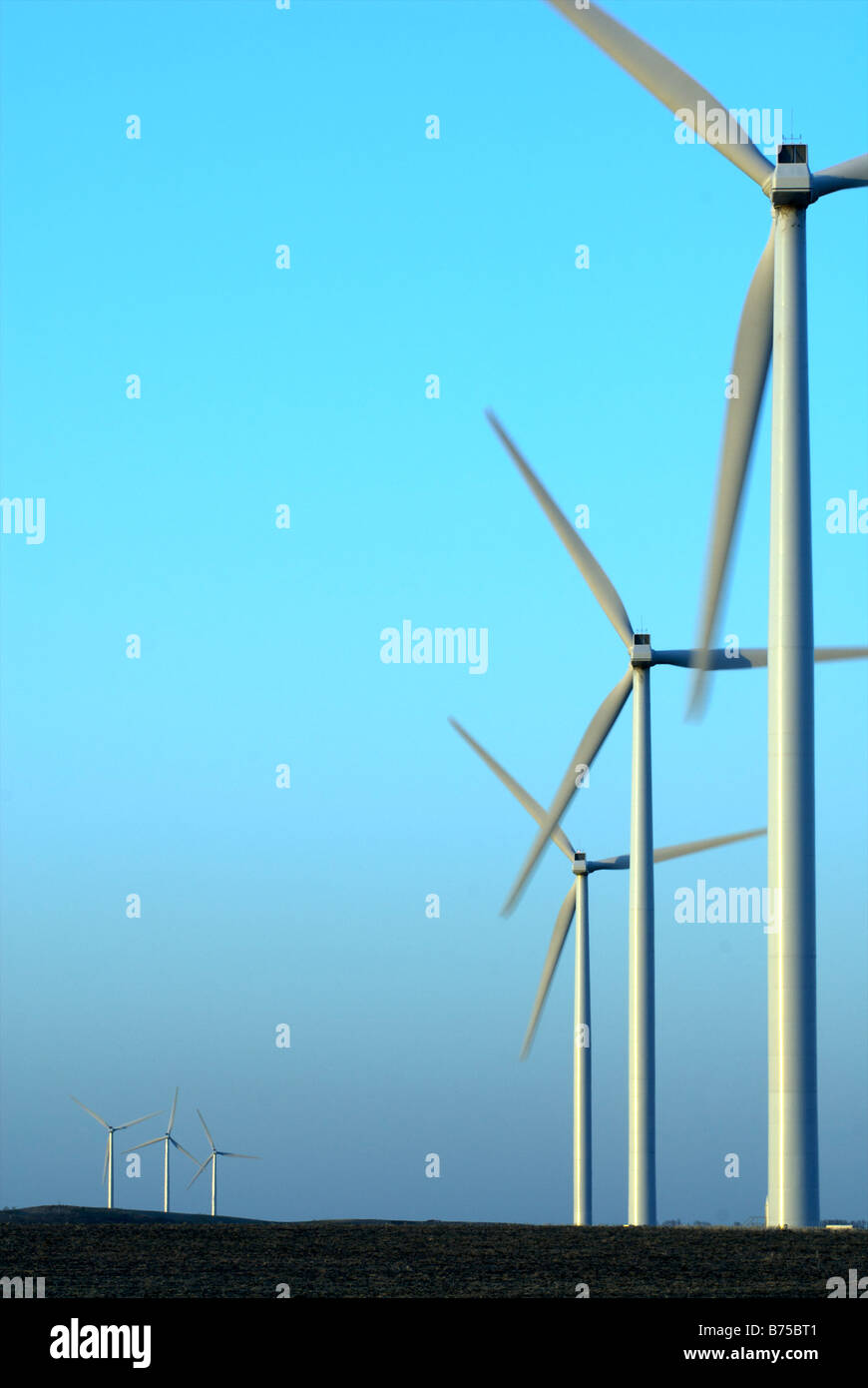 Row of wind turbines Stock Photo - Alamy