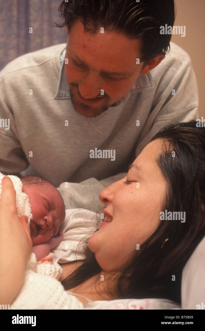 Couples with new born hi-res stock photography and images - Alamy