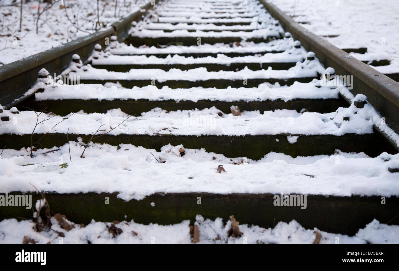 Rail tracks covered in snow Stock Photo - Alamy