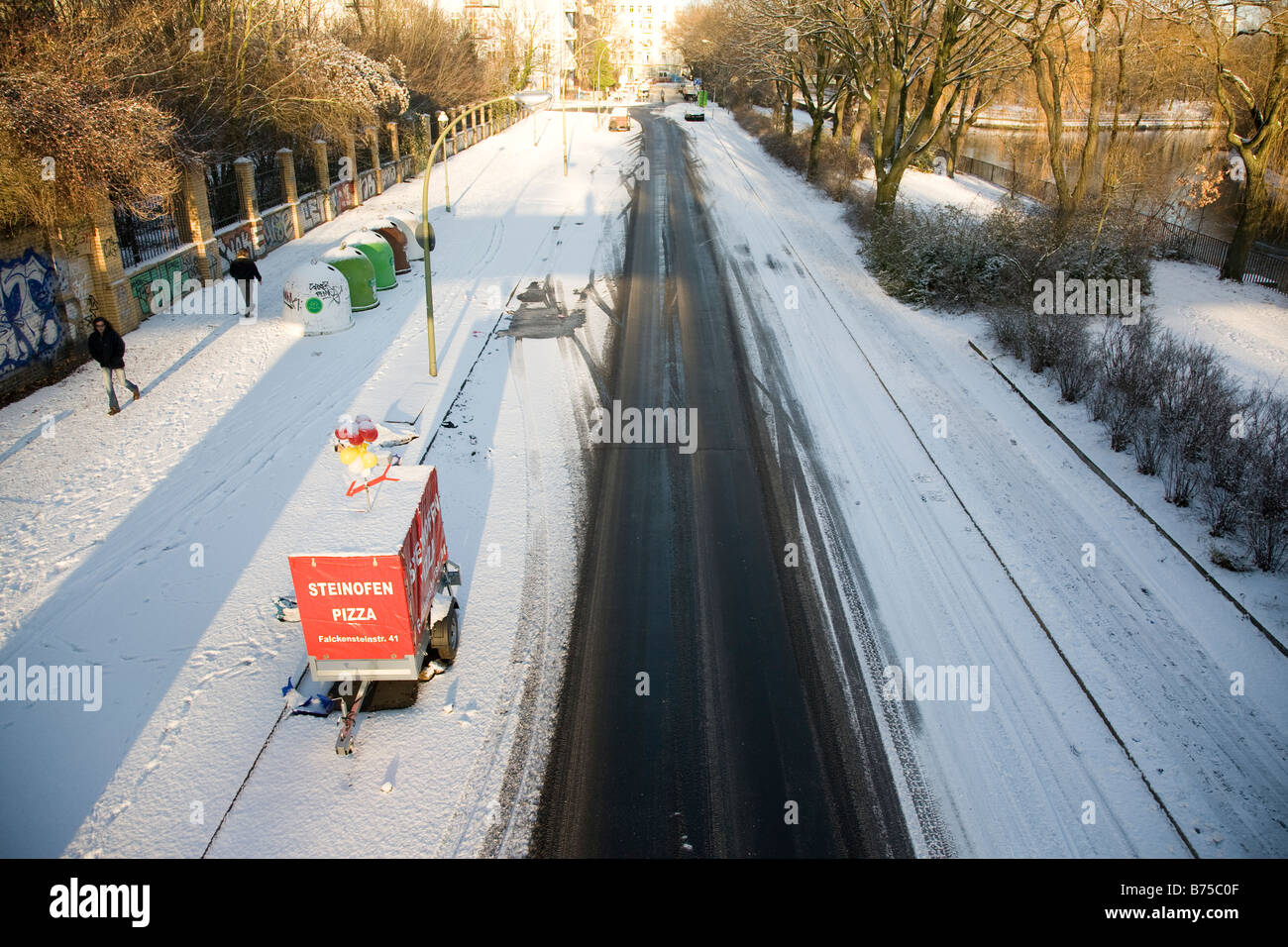 A Pathway cut through a snow covered street by cars Stock Photo - Alamy