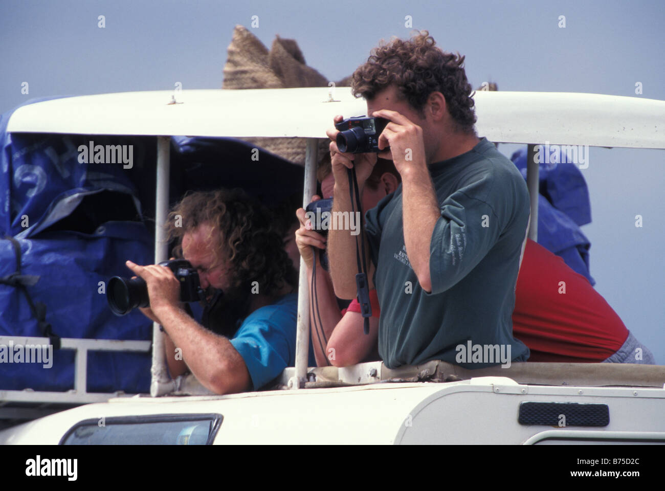 tourists snapping pictures Stock Photo - Alamy