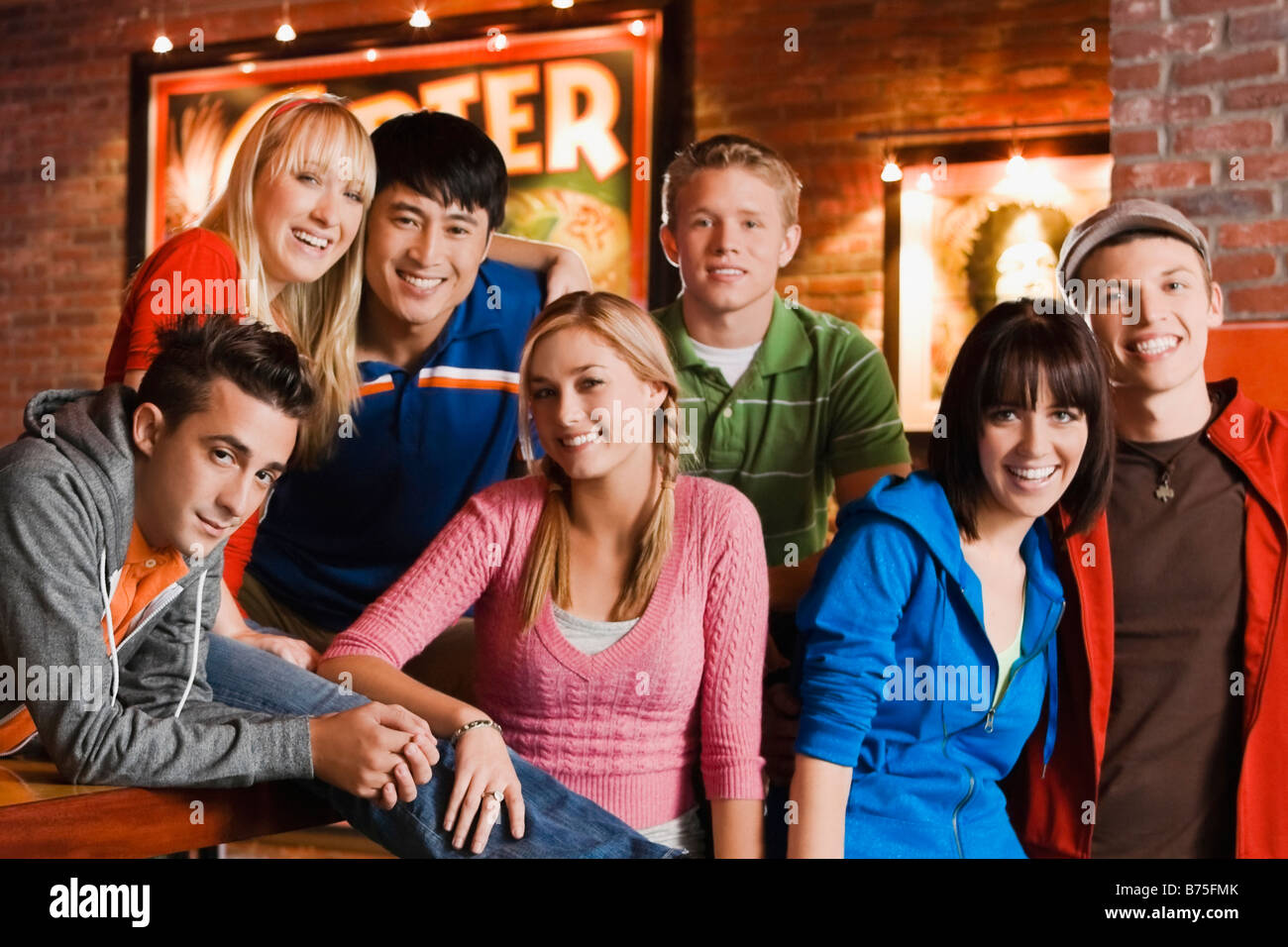 Portrait of a group of friends smiling Stock Photo - Alamy