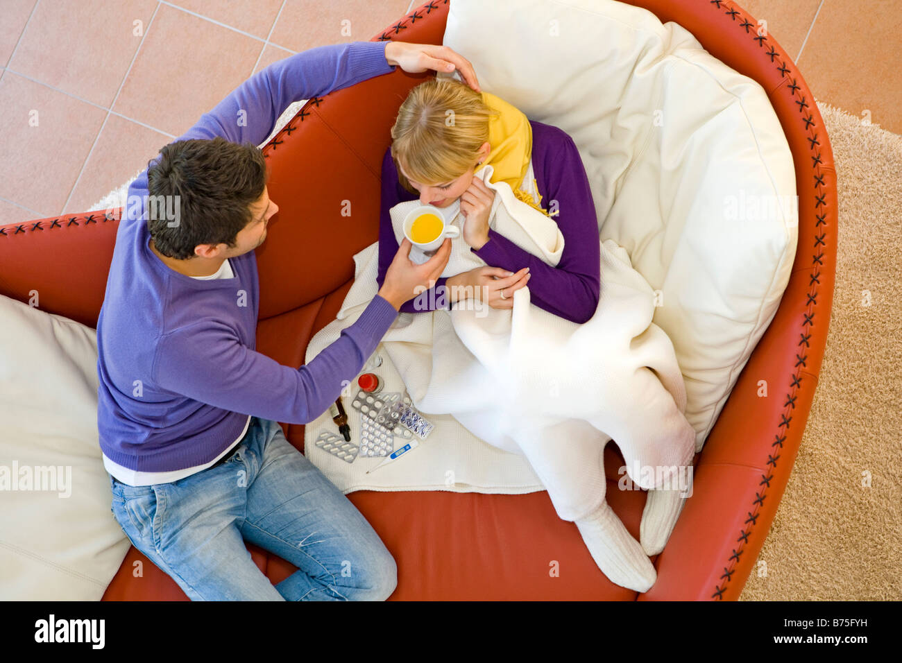 Frau mit einer Erkaeltung, woman having a cold Stock Photo - Alamy