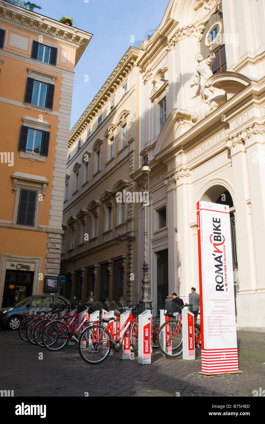 Rental bikes in street in rome hi-res stock photography and images - Alamy