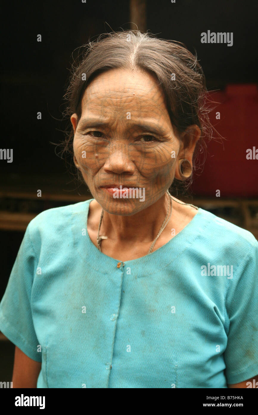 old myanmar lady with traditional tattoo on the face Stock Photo - Alamy