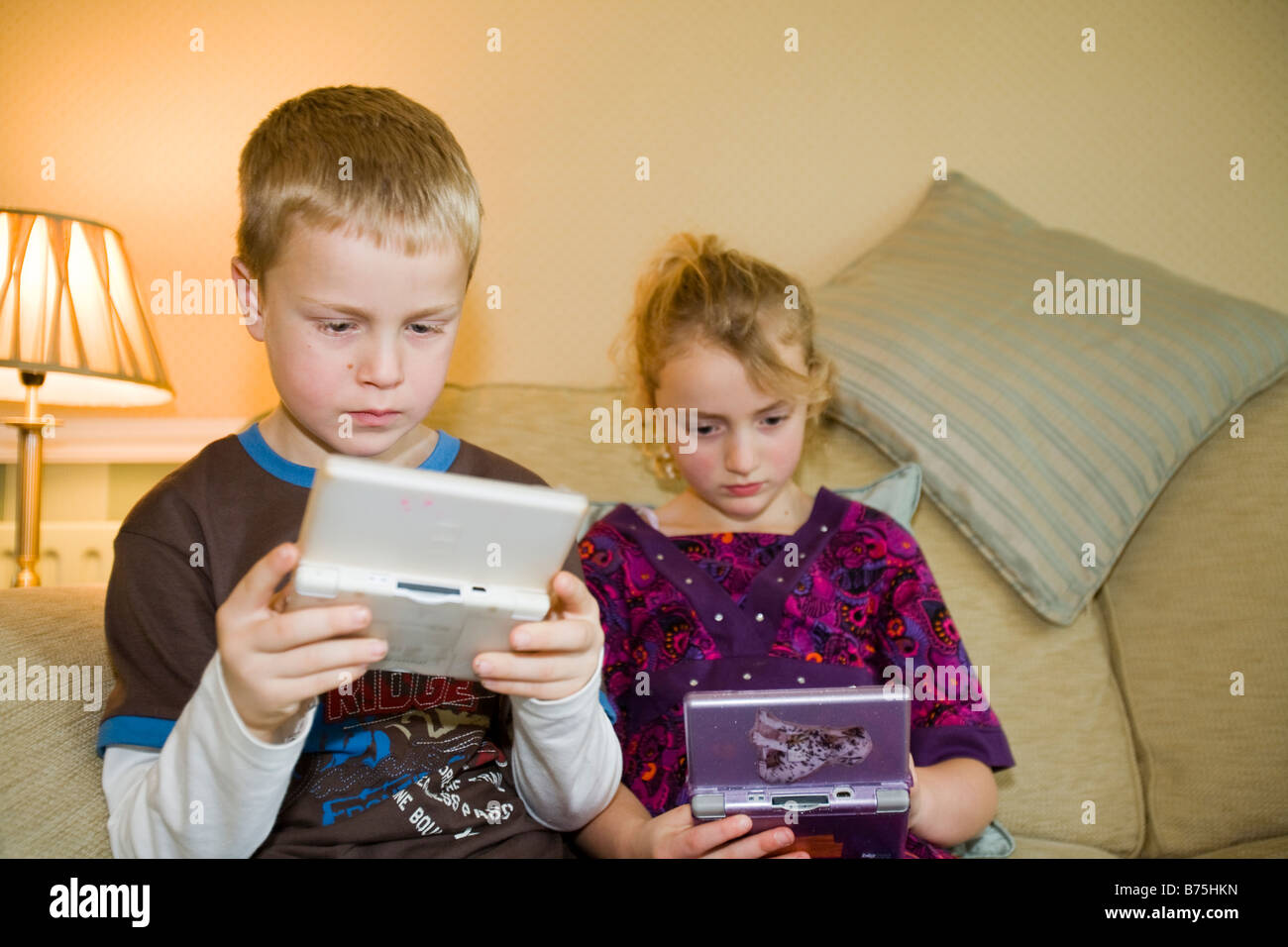 A family playing computer games on a console Stock Photo - Alamy