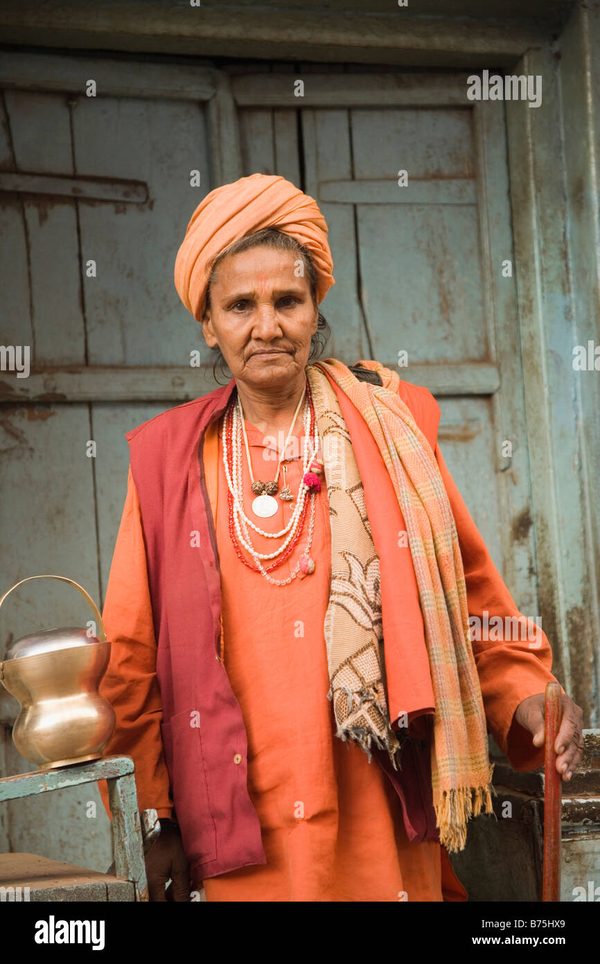 Portrait of a female saint standing in front of a door, Kumbhalgarh ...