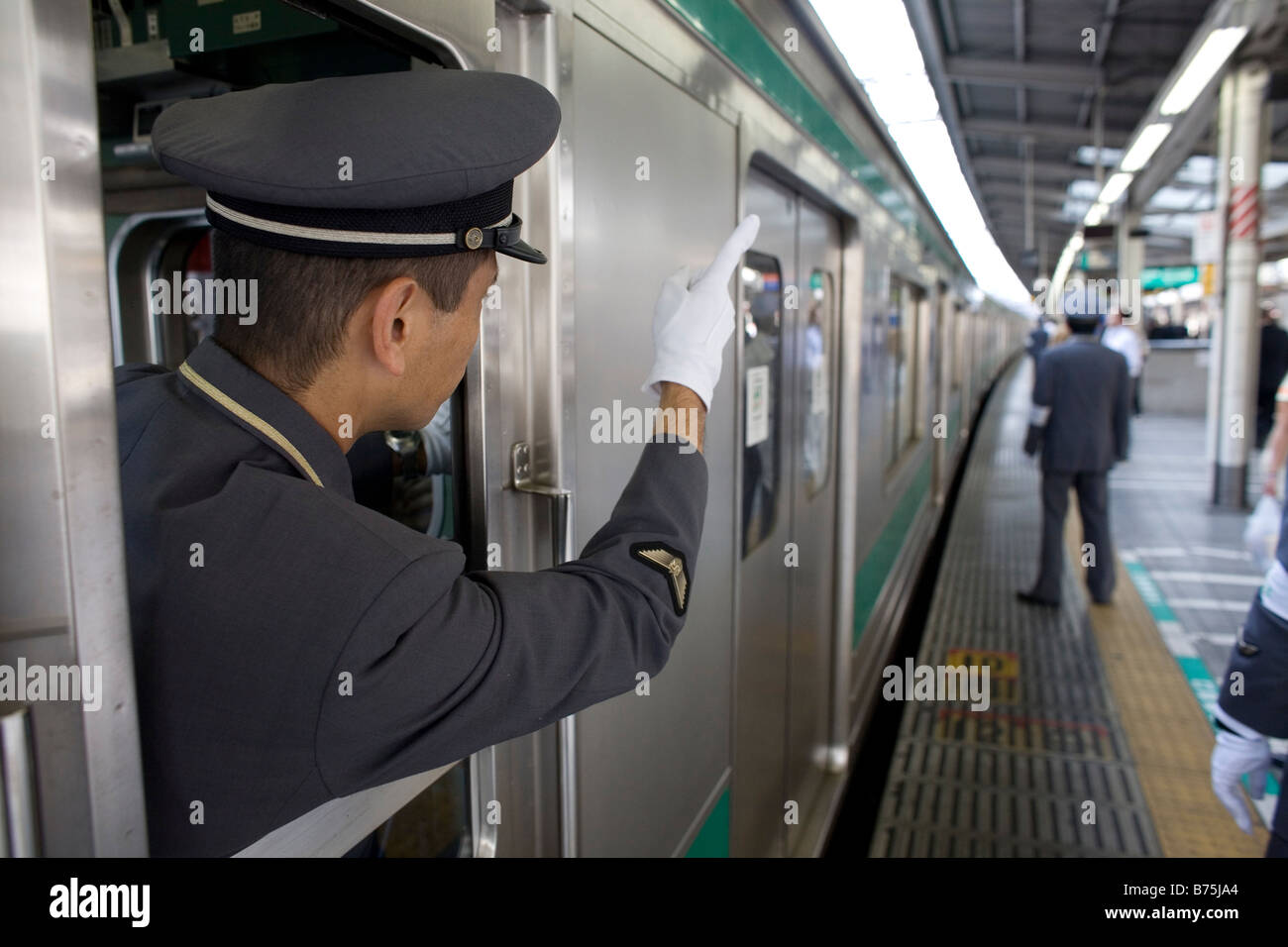 Japan subway guard train hi-res stock photography and images - Alamy