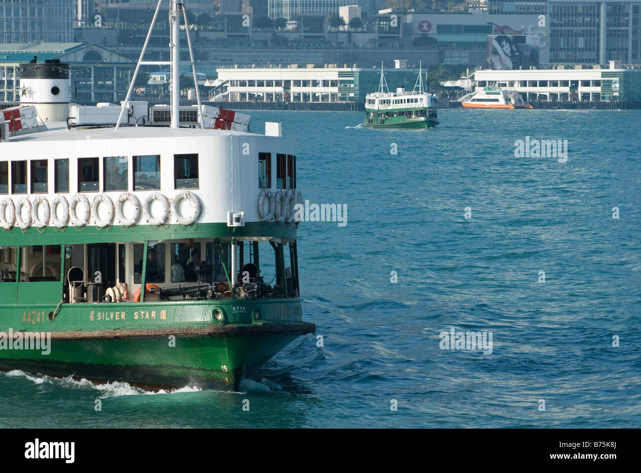 Star Ferry Silver Star arriving at the Kowloon terminal Stock Photo - Alamy