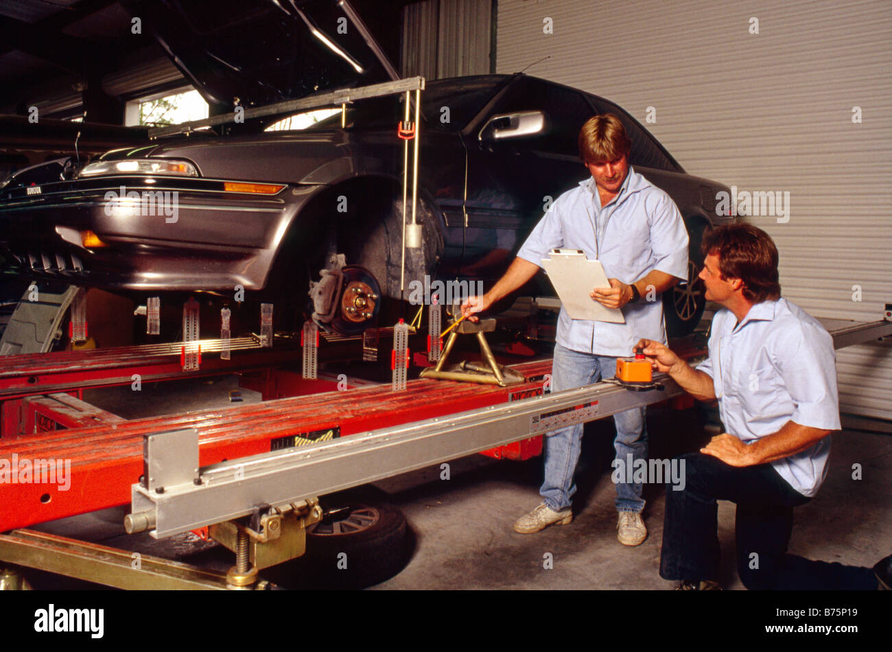Straightening Auto Frame in a body shop Stock Photo - Alamy