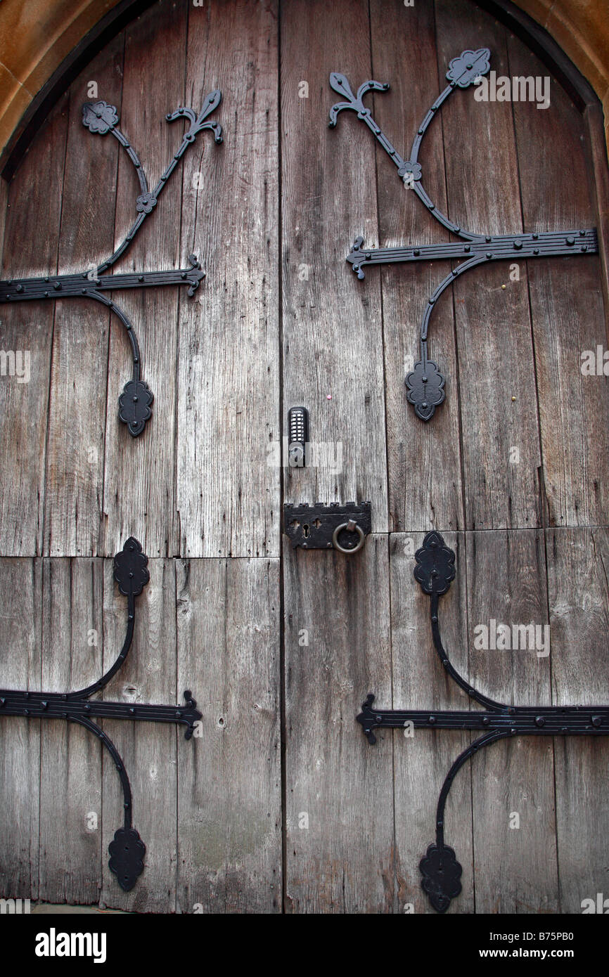 old door locked and secured with modern code key lock Stock Photo - Alamy