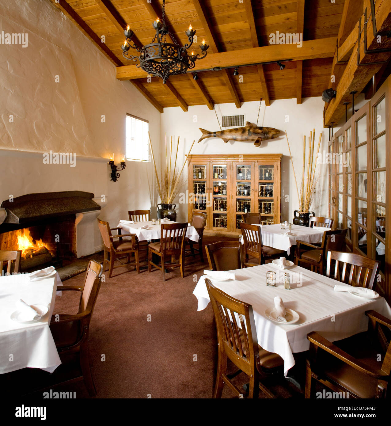Banquet dining room with several tables Stock Photo - Alamy