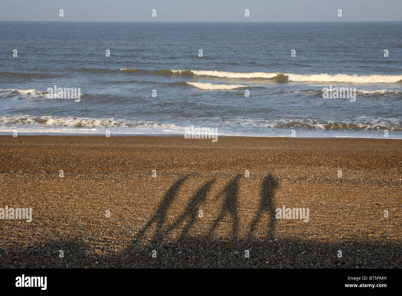 Shadows on the Beach Stock Photo - Alamy
