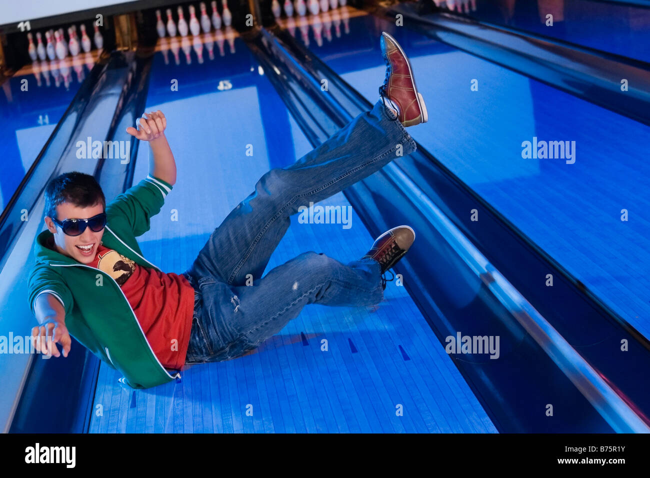Person sliding on floor hi-res stock photography and images - Alamy