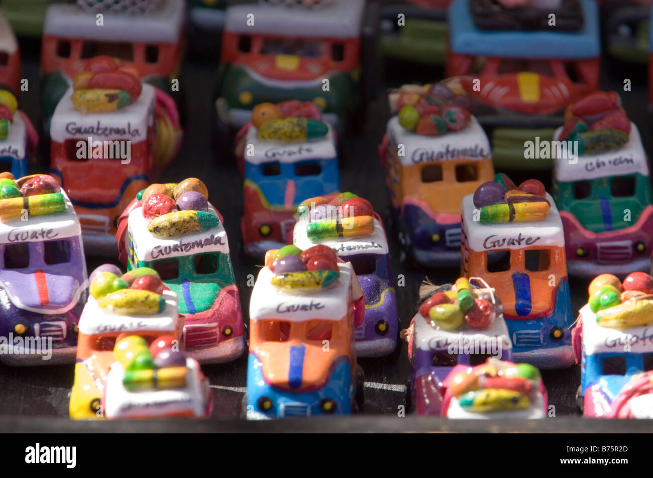 Souvenir chicken buses made of clay sold on the market of ...