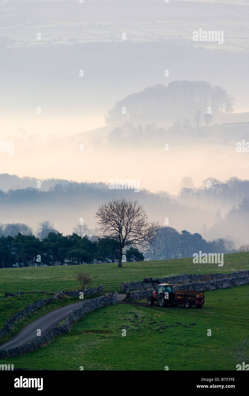 Morning mist, or inversion fog, over farmland in valley of the River ...