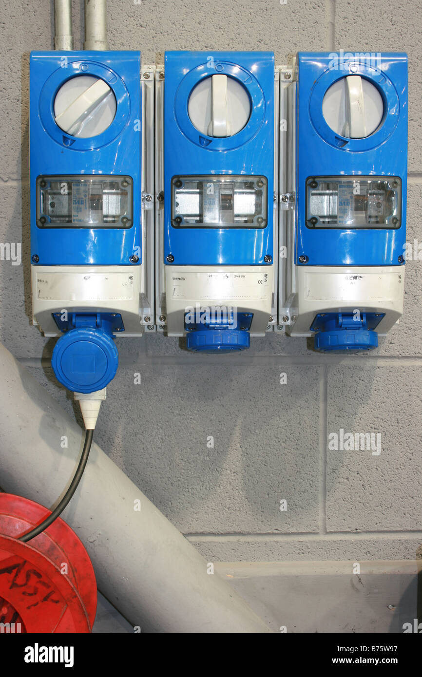 three phase electrical sockets on factory wall Stock Photo - Alamy