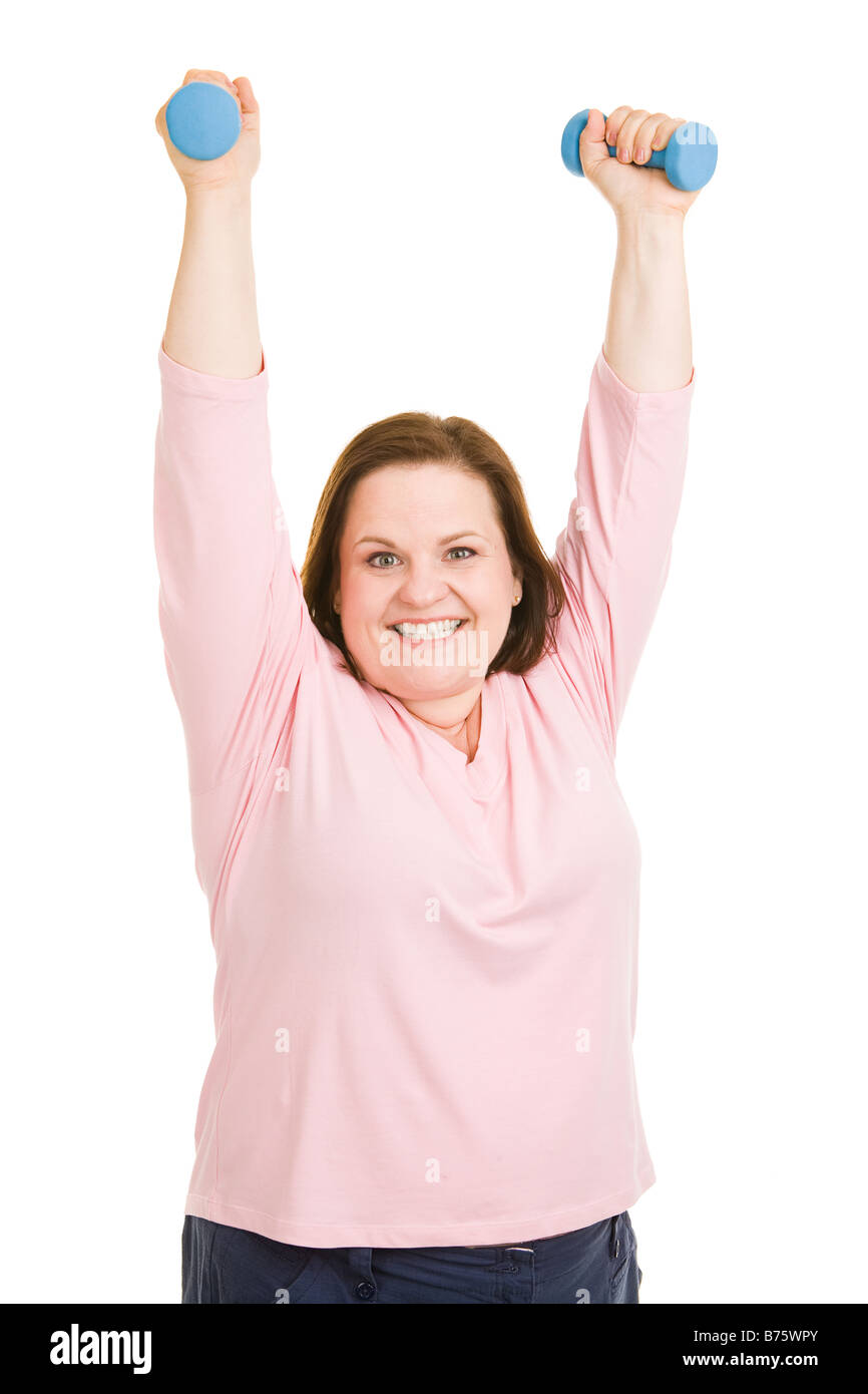 Beautiful plus sized model enjoys working out with free weights ...