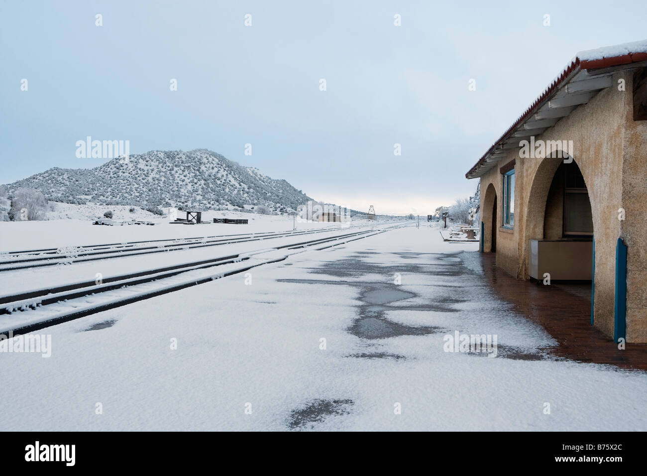 Railroad tracks covered with snow Stock Photo - Alamy