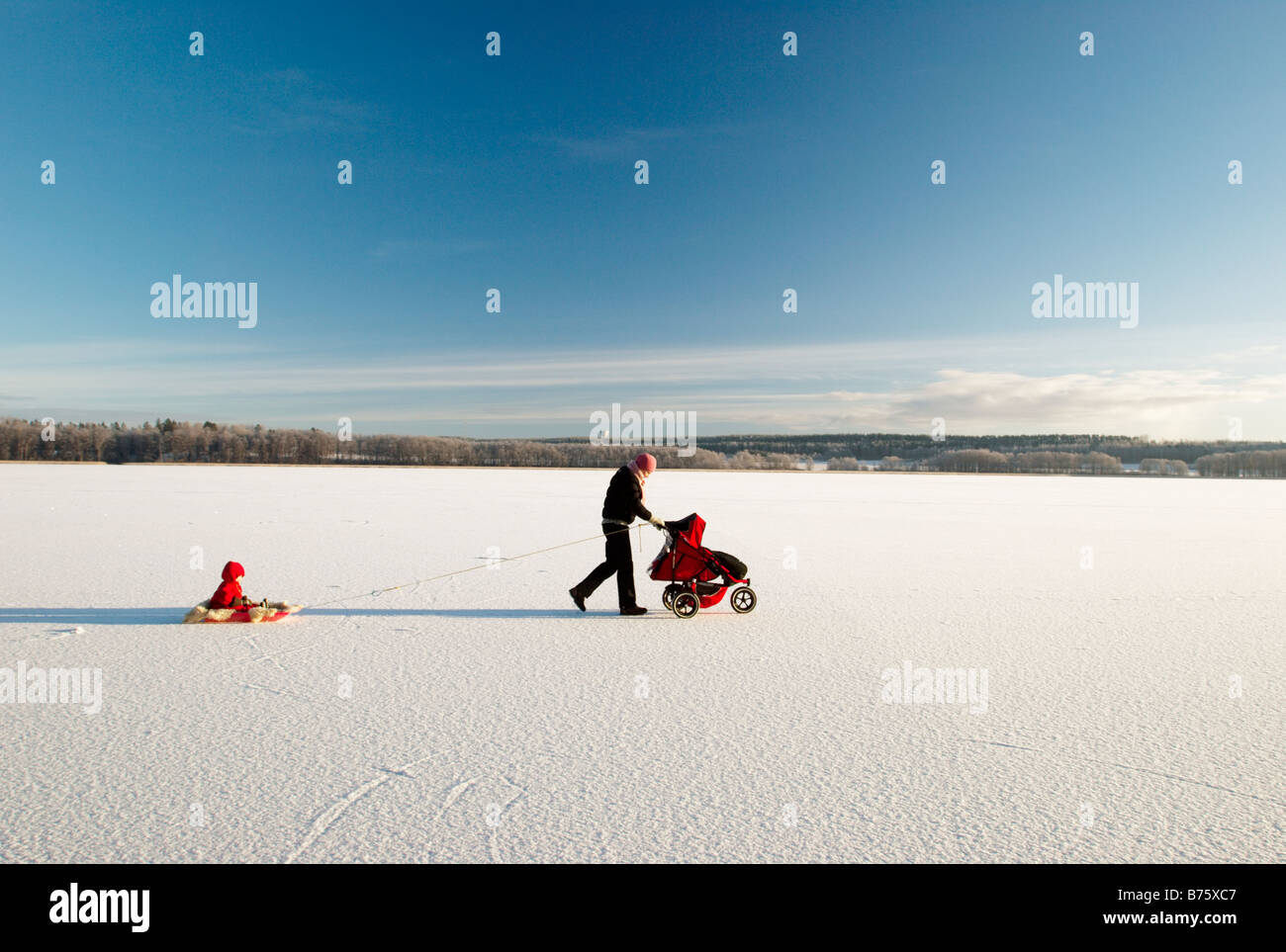 Child sled walking hi-res stock photography and images - Alamy