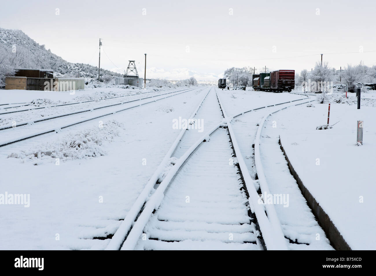 Railroad tracks covered with snow Stock Photo - Alamy