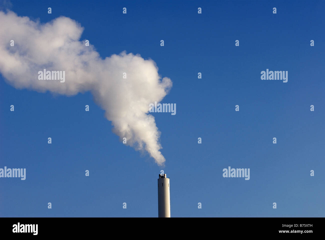 Smoke from a chimney at the Shell oil refinery, Godorf, Cologne, North ...
