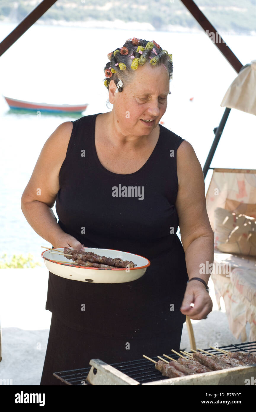Greek woman cooking hi-res stock photography and images - Alamy